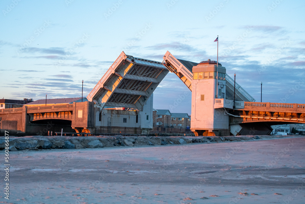 Sunrise on the drawbridge over the Shark River inlet on the New Jersey ...