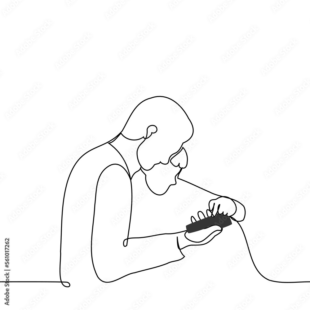 teenager shows an adult what is on the phone in the hand of an adult ...