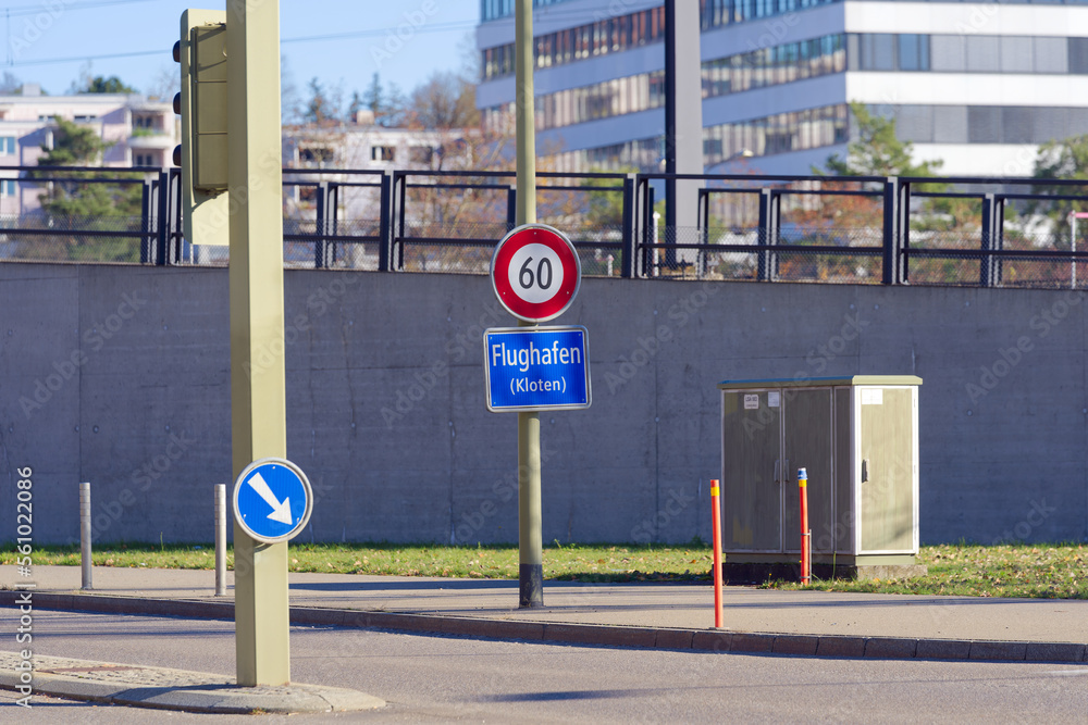 Traffic signs at entrance of City of Kloten and Zürich Airport on a ...