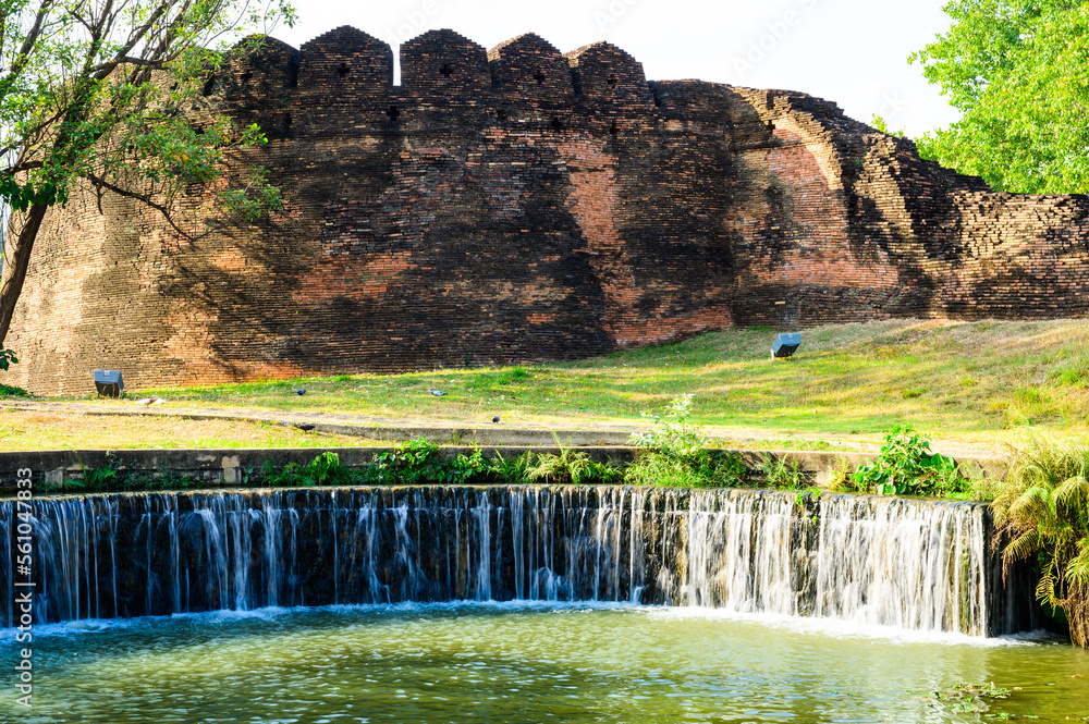 Ancient brick wall and overflow weir Stock Photo | Adobe Stock