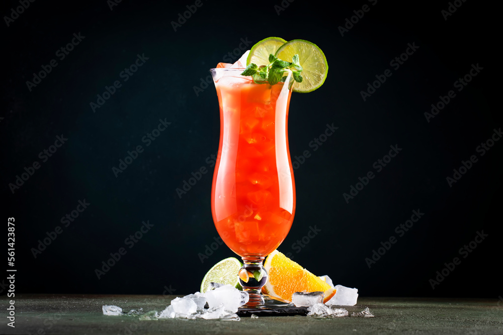 Hurricane, classic alcoholic cocktail with dark and white rum, ice ...