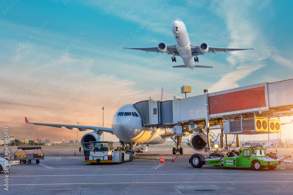 Aircraft is attached to the terminal gangway of the airport building ...