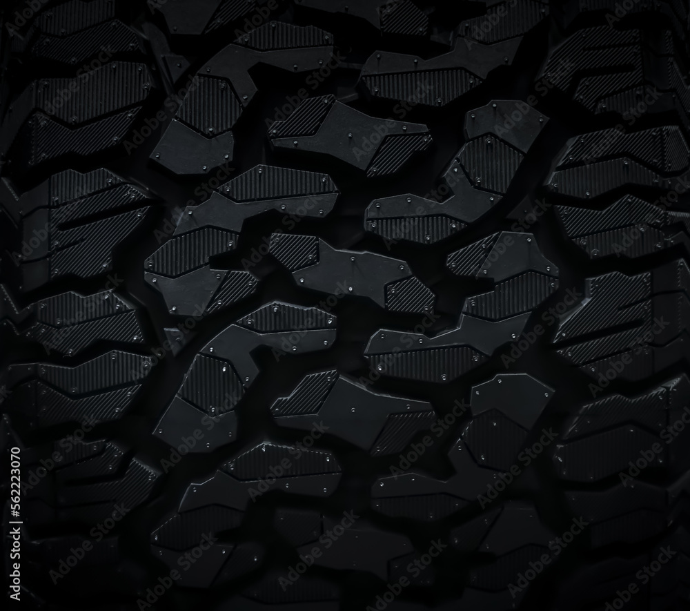 Close up picture of brand new black automobile Tyre texture on black ...