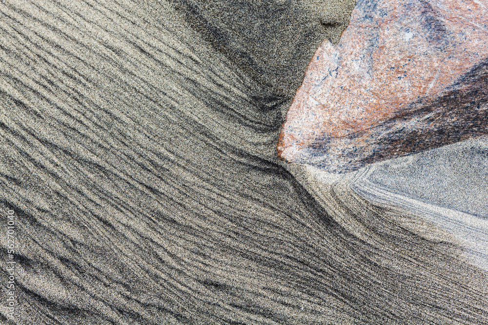 Patterns caused by sediment transport by water in the sand on Bunes ...