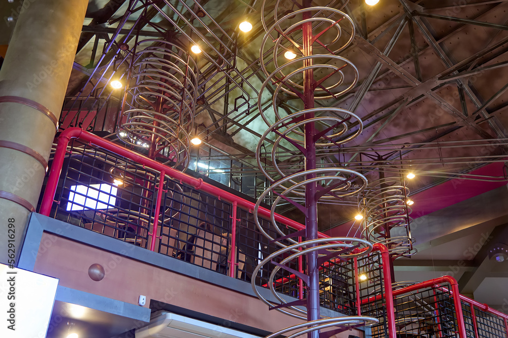 Spiral track in a restaurant attraction where ready meals descend for ...