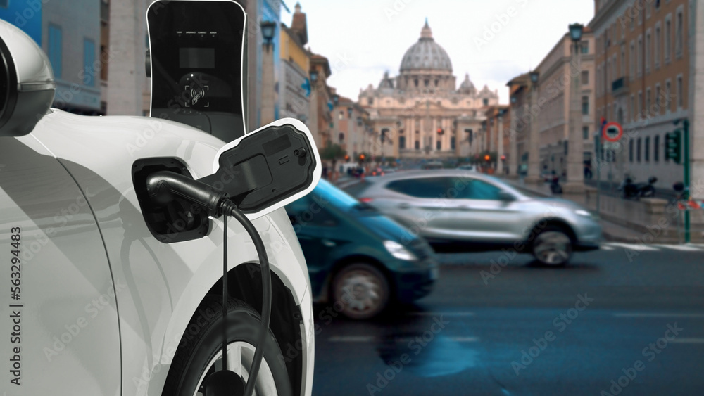 Progressive electric car recharging battery at the charging station in ...