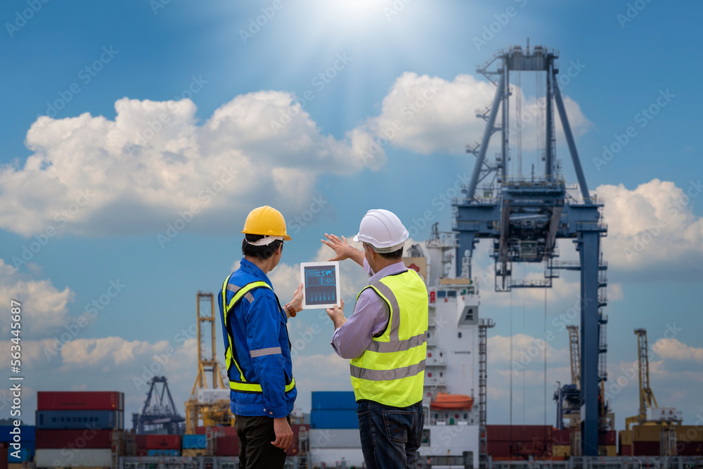 Engineer wearing uniform inspection and see detail on tablet with ...