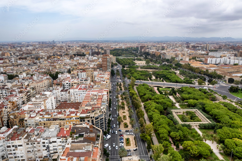 Aerial drone view of sunrise over Turia Gardens, a riverbed turned into ...