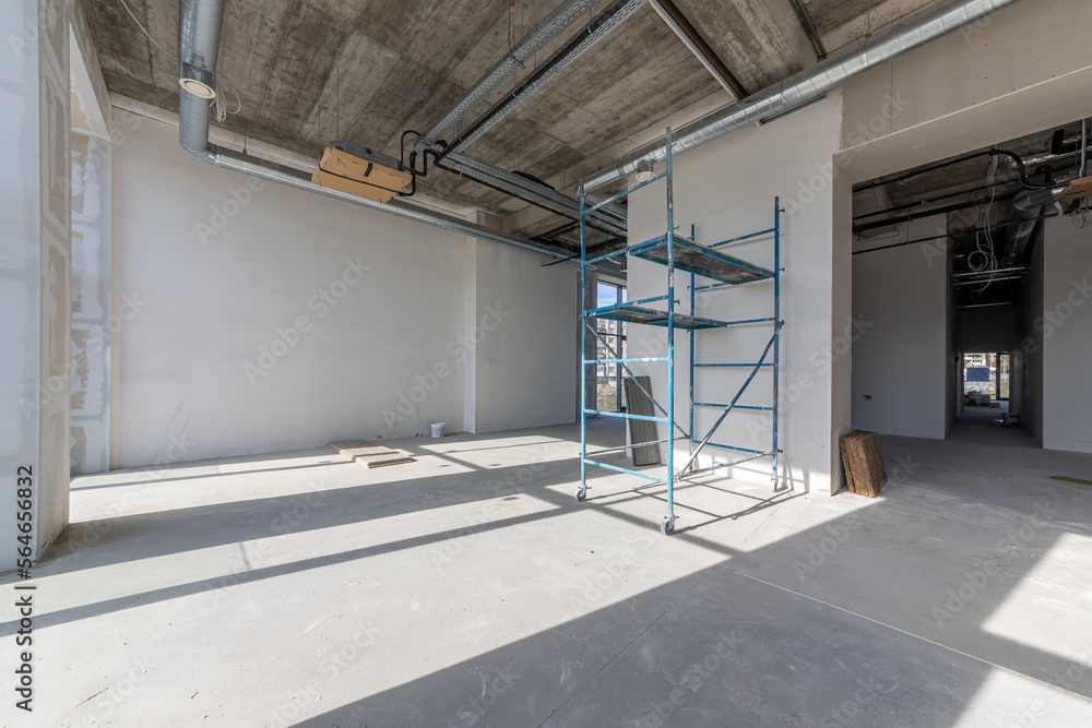 Room is under renovation or under construction. Scaffolding in the ...