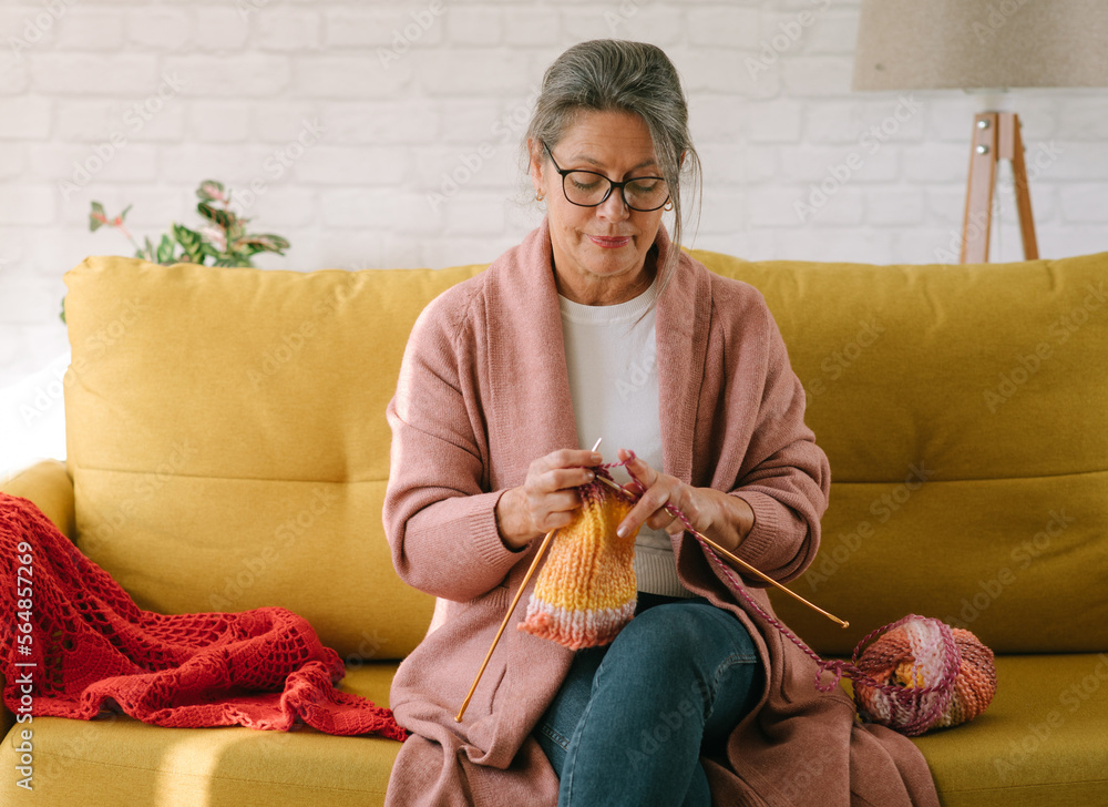 Woman Knitting Stock Photo | Adobe Stock