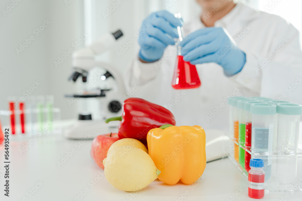 Scientist check chemical food residues in laboratory. Control experts ...