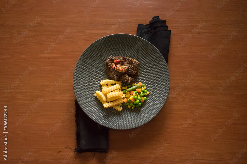 tender well done beef steak angle landscape photo. this photo is really ...