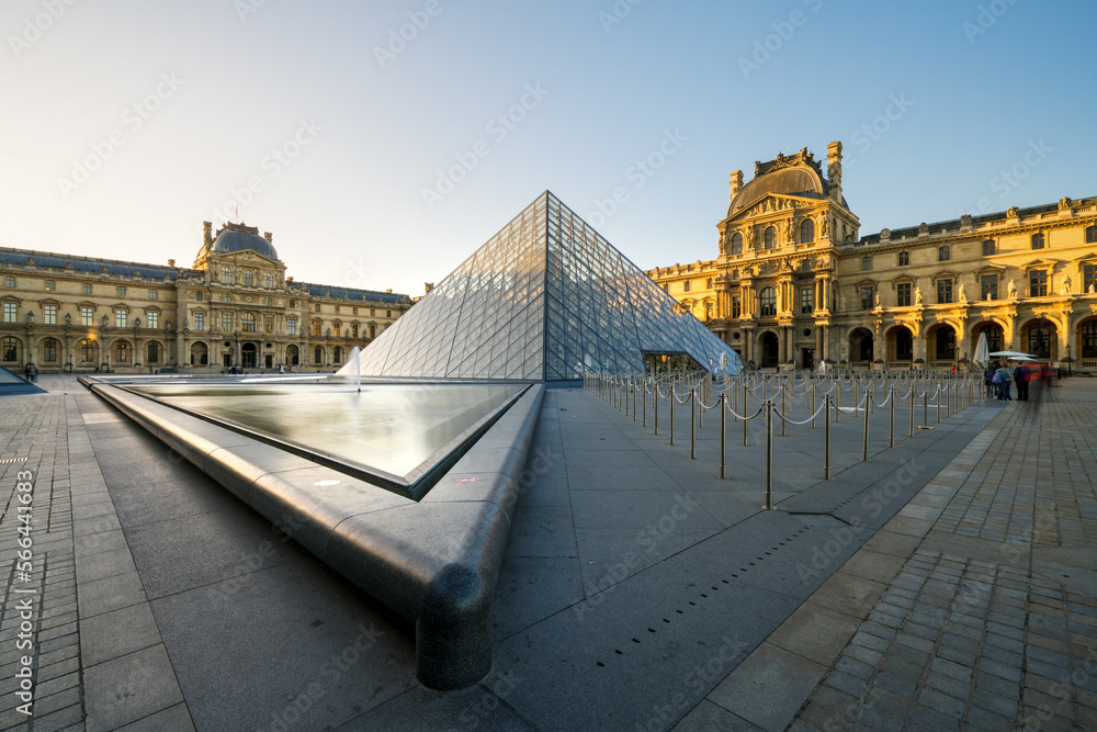 Paris Louvre Museum at sunrise. Home to Leonardo da Vinci's Mona Lisa ...