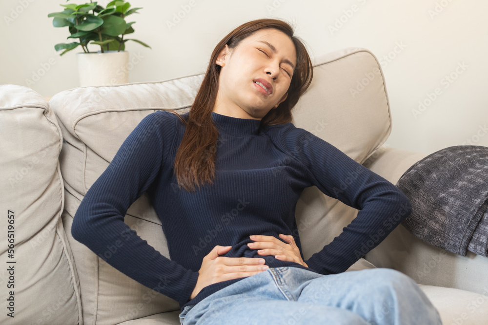 Flatulence asian young woman, girl hand in stomach ache, suffer from ...