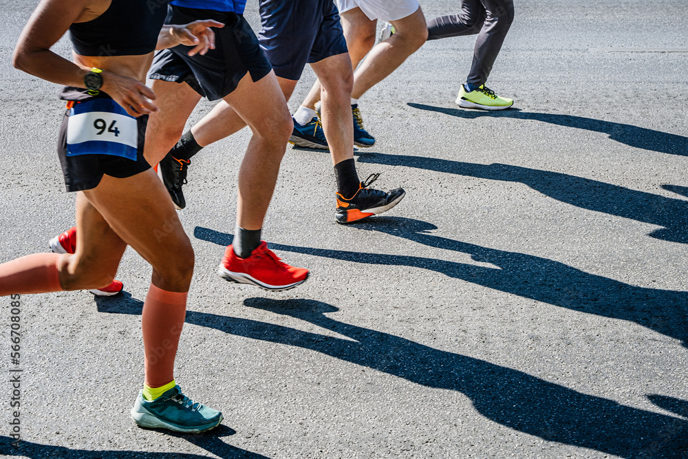 legs group runners run marathon race on road Stock Photo | Adobe Stock