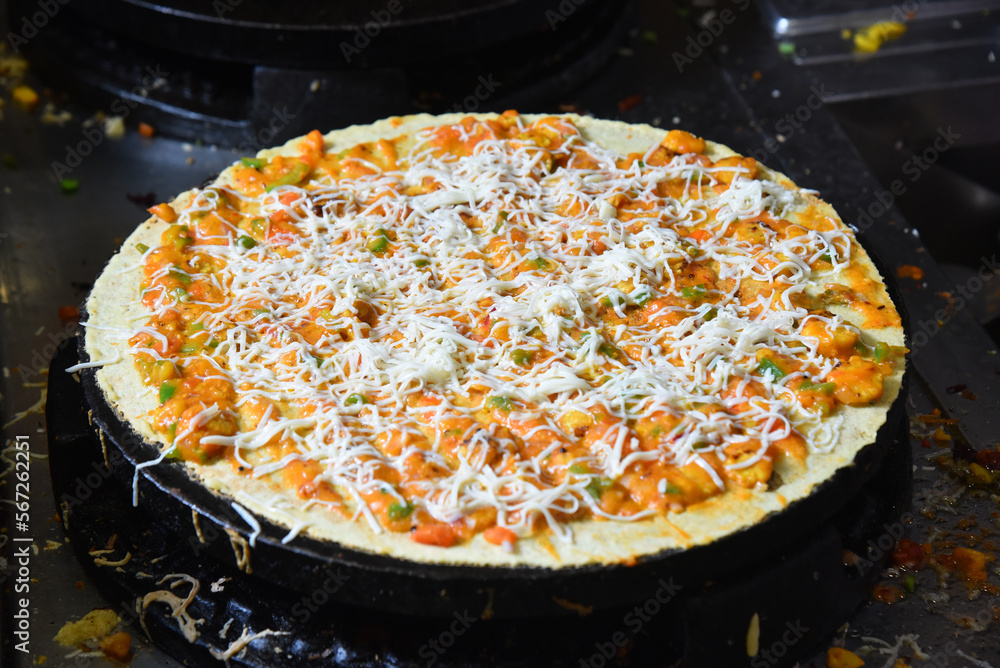 A dosa, also called dosai, dosey, dwashi or dosha is a thin pancake in ...