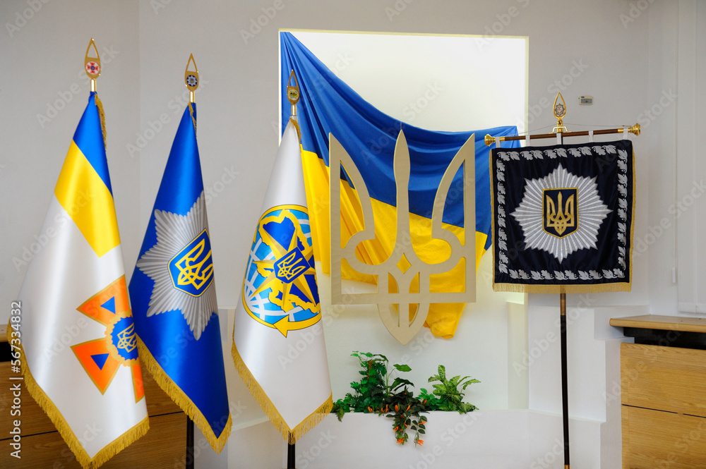 Coart of arms and flags of Ukrainian police units set in the press ...