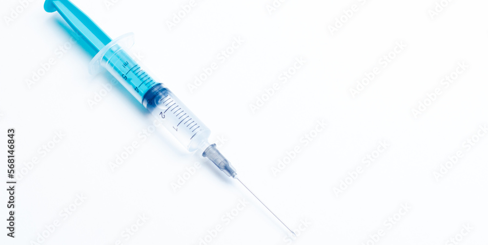 Disposable plastic syringe prepared for injection and vaccination in ...