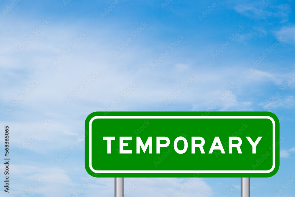 Green color transportation sign with word temporary on blue sky with ...