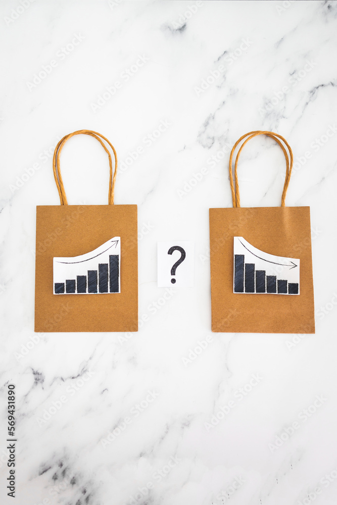 when will inflation go down. shopping bags with graph showing prices ...