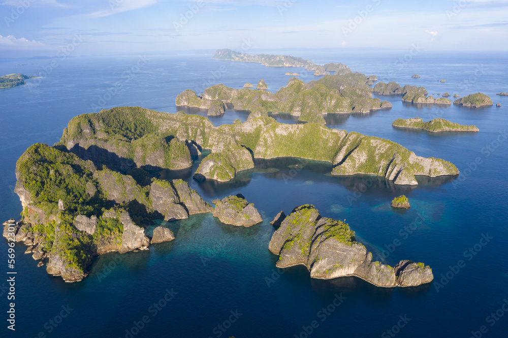 Beautiful limestone islands rise from the Raja Ampat, Indonesia ...