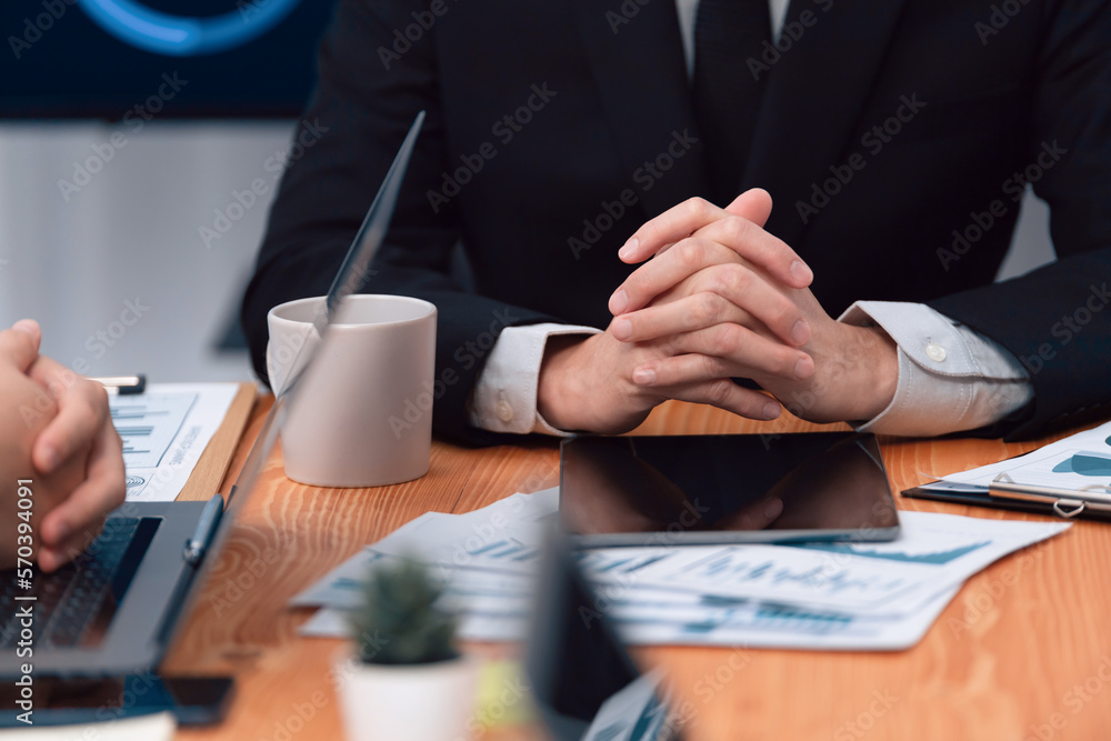 Fotografie Closeup focus boss body language executive, CEO sitting ...