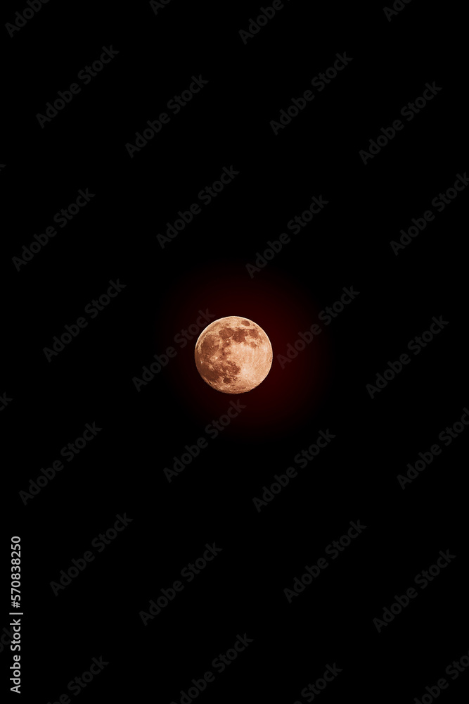 Super full moon with dark background. A full moon or a new moon that ...