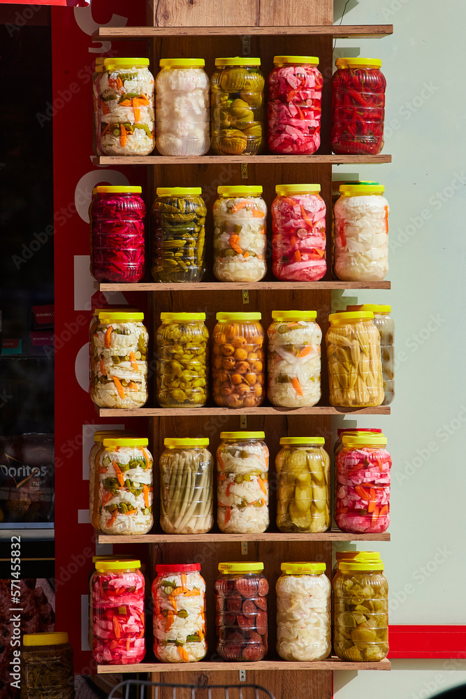 Close-up of various homemade pickles. Spicy preserves: small pickled ...