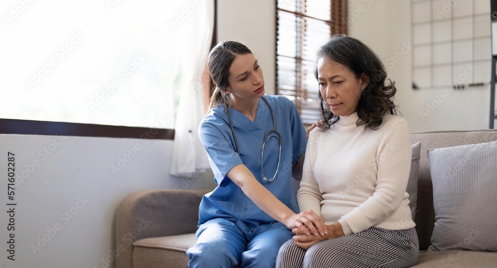 Female doctor holding female patient hands with compassion and comfort ...
