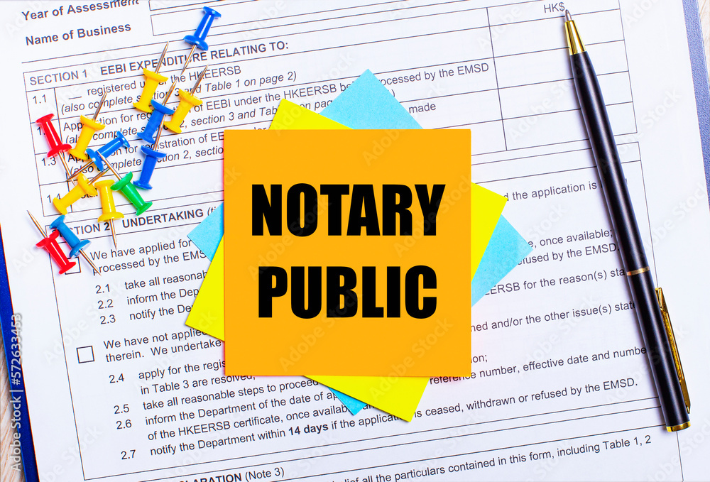 Colored stickers with the text NOTARY PUBLIC, colorful paper fasteners ...