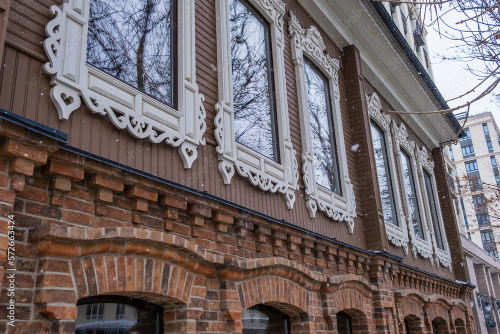 Carved window frames of the historic building after reconstruction ...