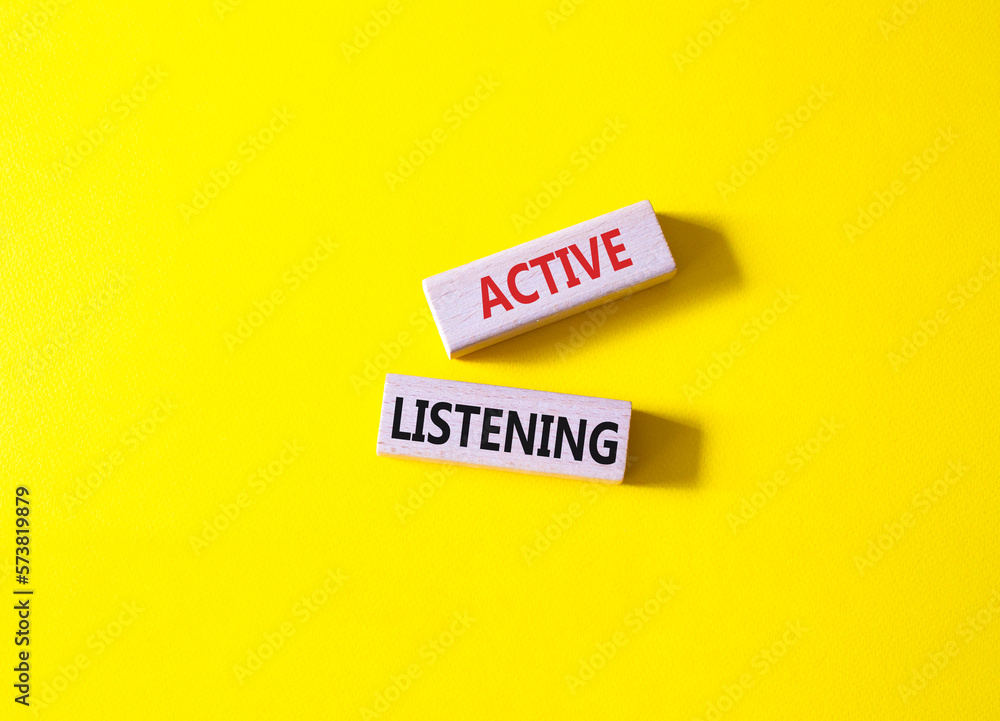 Active listening symbol. Wooden blocks with words Active listening ...