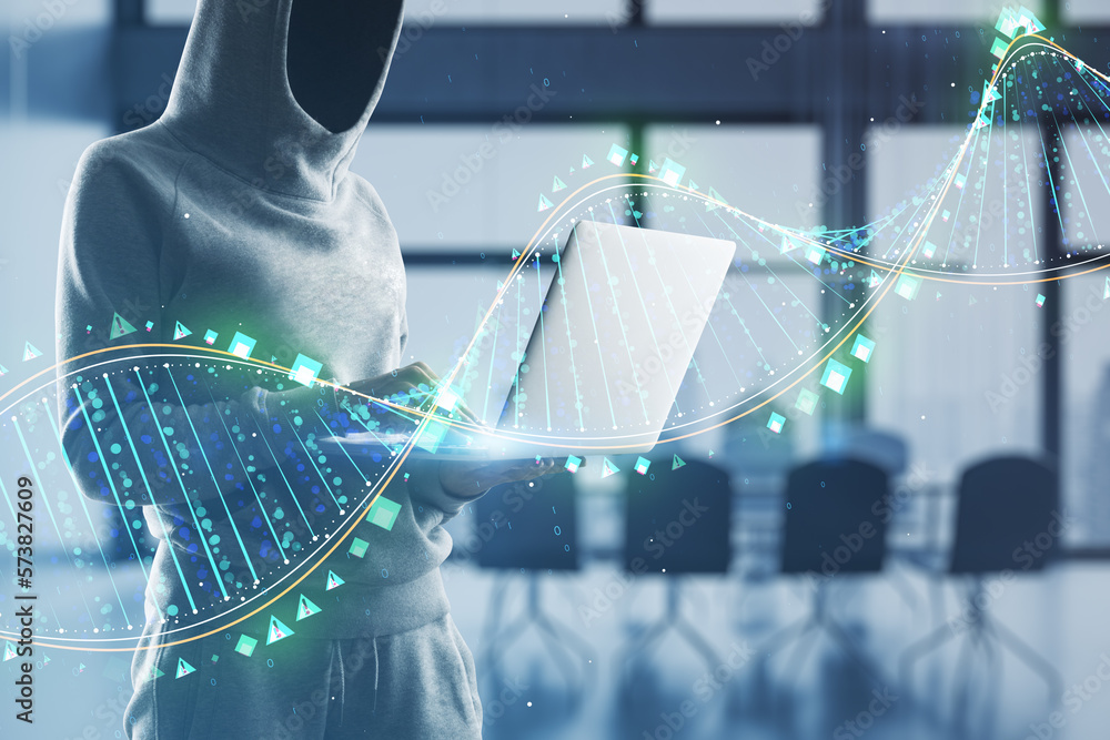 Hacker using laptop with glowing binary code DNA helix on blurry office interior background ...