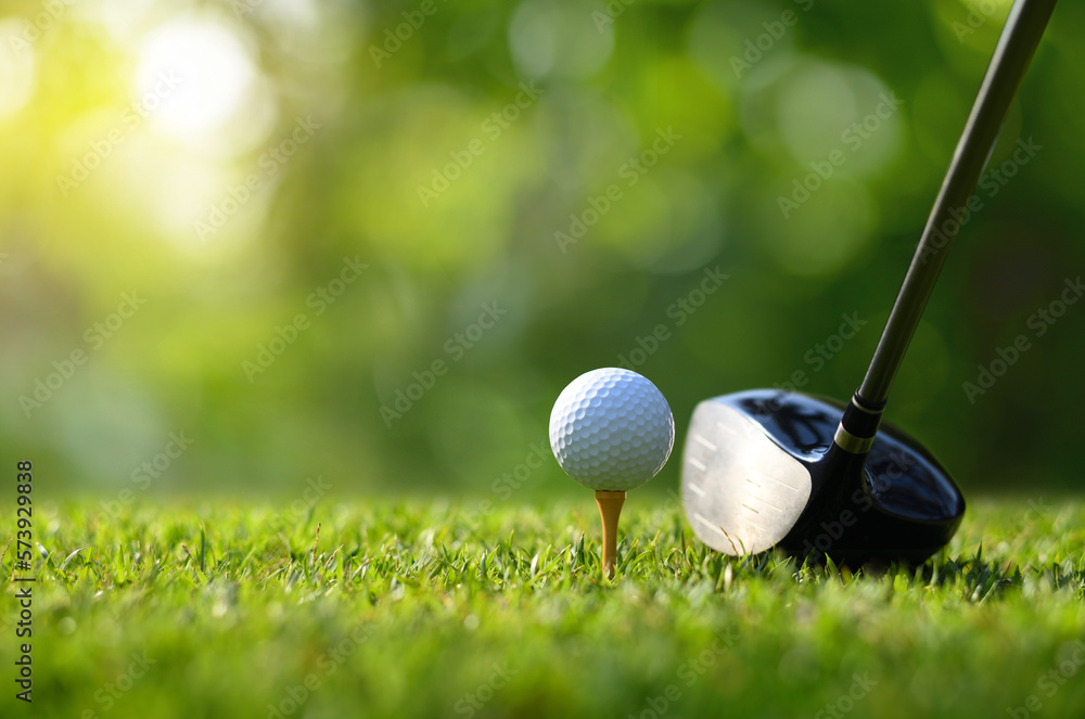 Close-up golf ball on tee with golf drivers at golf course. Stock Photo ...