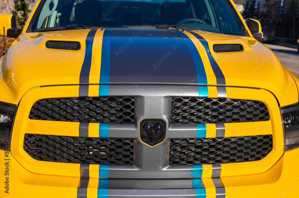 Front of pick up truck RAM. Brand new Dodge Ram pick up truck in yellow ...