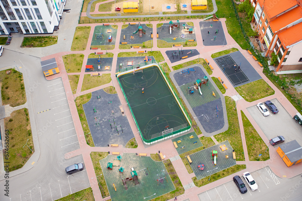 courtyard of modern residential complex, sports ground, playground for ...