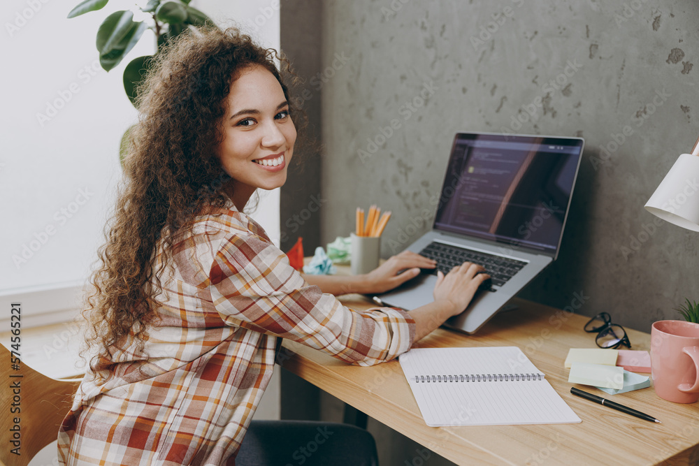 Side view young fun programmer student smart successful employee IT business woman of African ...