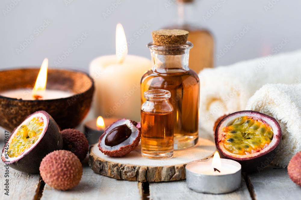 Foto de Stock Glass bottles with pure organic essential litchi and ...