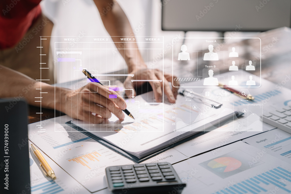 Businessman hand Project manager working and update tasks and Gantt ...