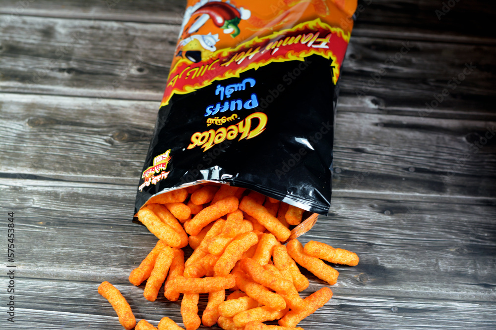 Cairo, Egypt, February 10 2023: Cheetos puffs with enriched corn meal ...