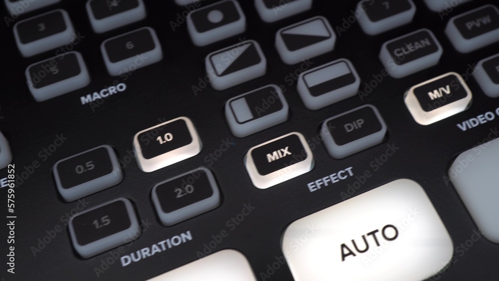 Professional digital mixer close-up. Camera control panel with many ...