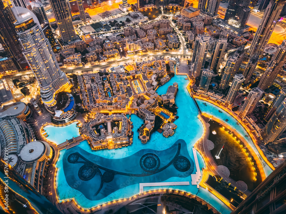 Aerial view of Downtown Dubai with roads, Dubai Mall and the fountain ...
