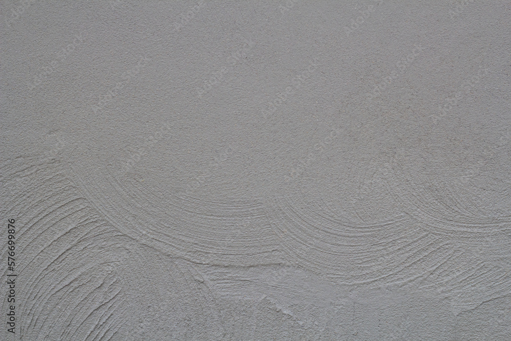 Texture of plaster cement wall is uneven and still wet for background ...