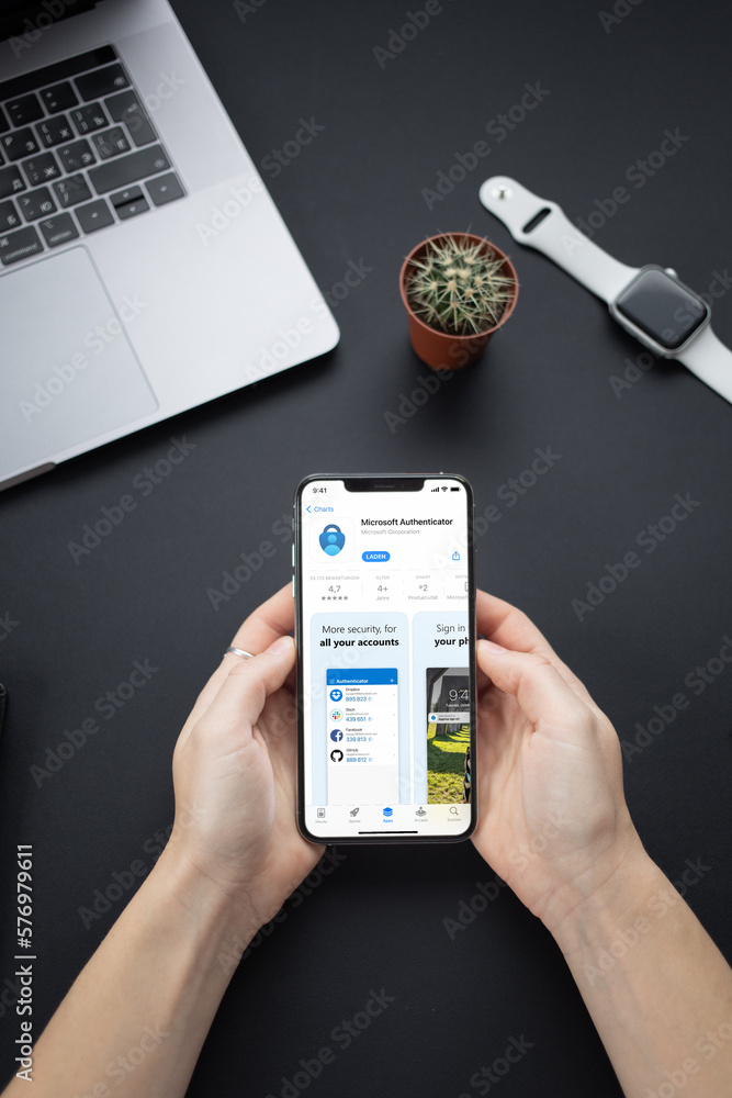 Mobile phone with Microsoft Authenticator App Store screen Stock Photo ...