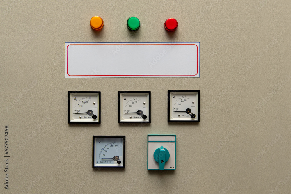 Analog voltmeter, amp meter and signal lamp on control panel of power ...