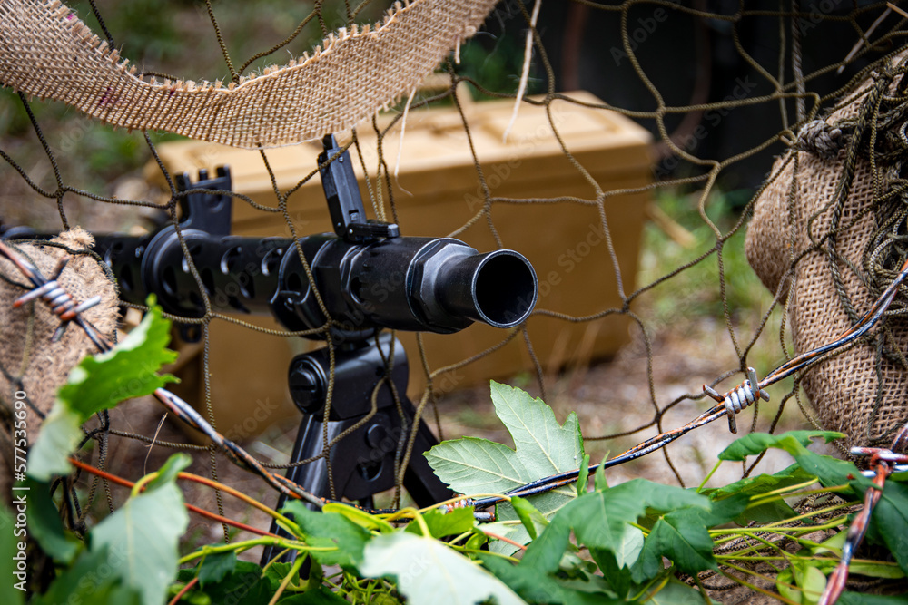 WWII German MG 34 machine gun behind camouflage netting Stock Photo ...