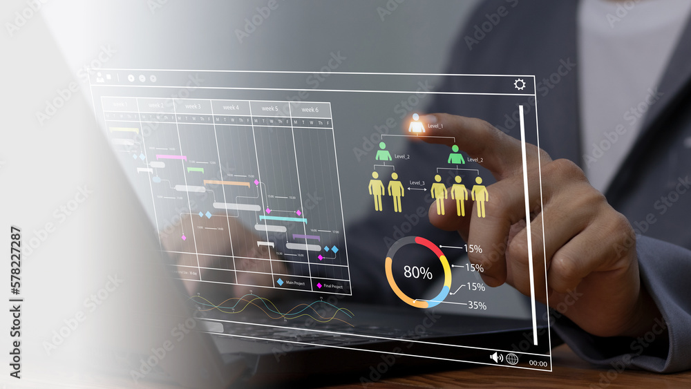 Analysts work with computers in management systems to create reports ...