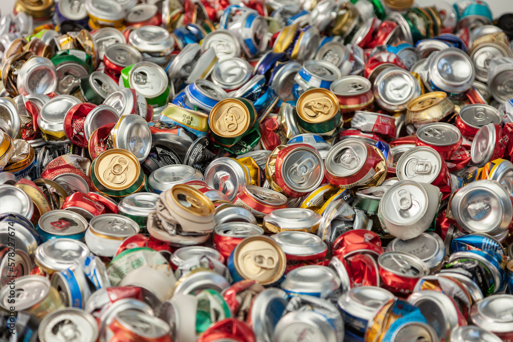 Background of crashed beer cans - recycling idea. Compressed beer can ...