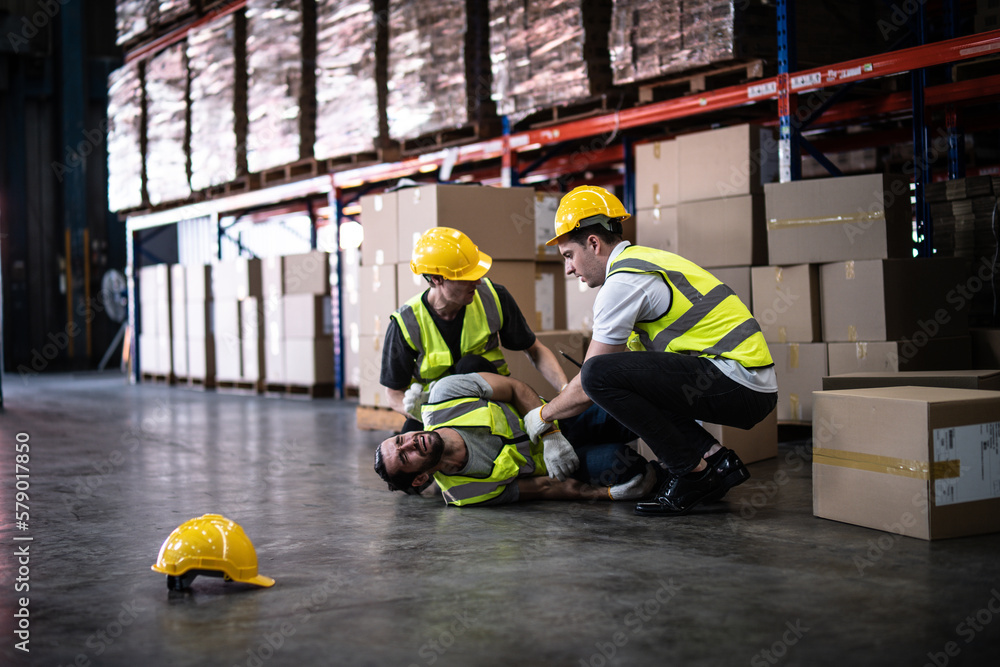 Careless Caucasian warehouse worker holds many large cardboard boxes ...