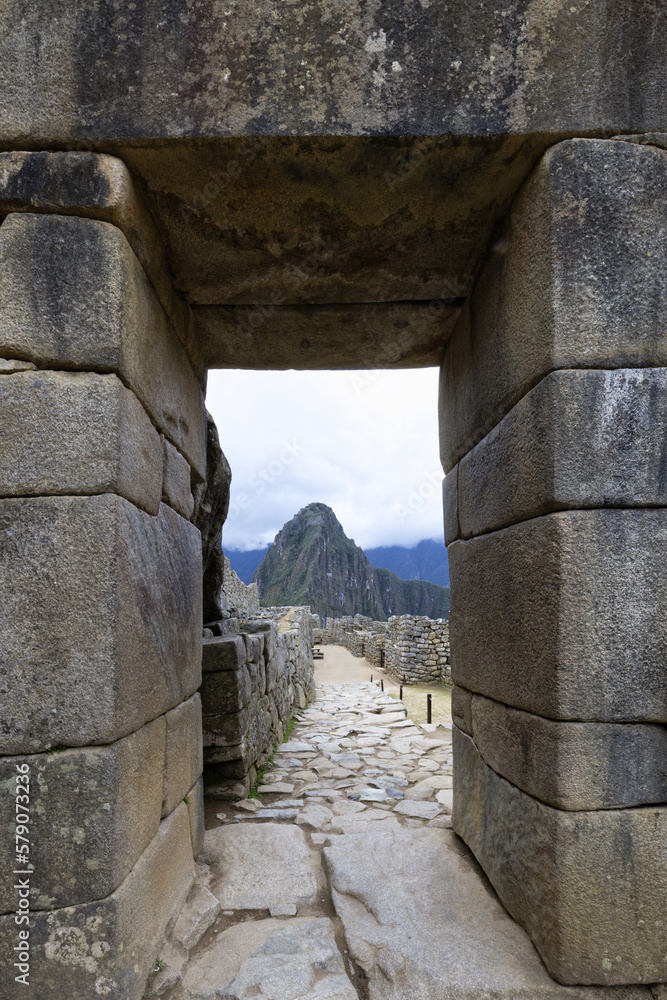 Machu Picchu, Gate in the ruined city of the Incas with the Mount ...
